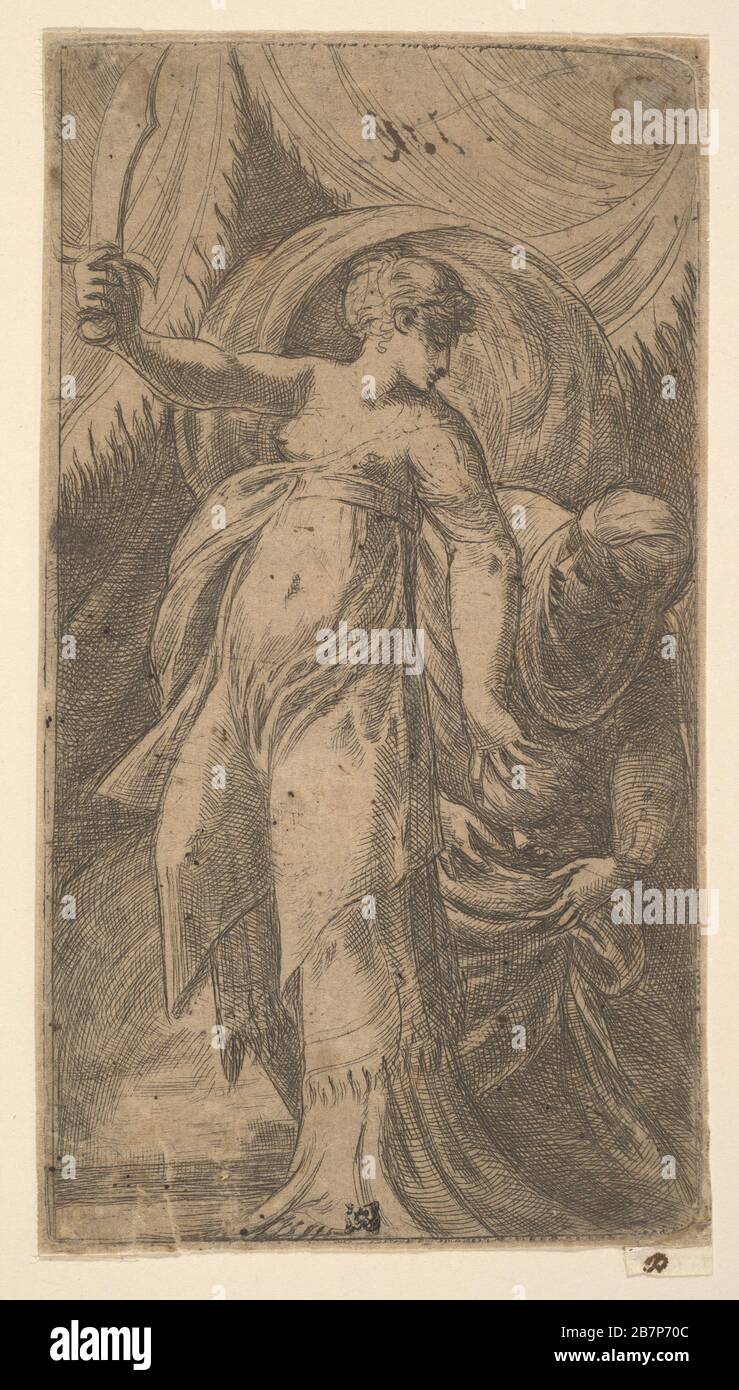 Judith with her sword raised in her right hand and placing the head of ...