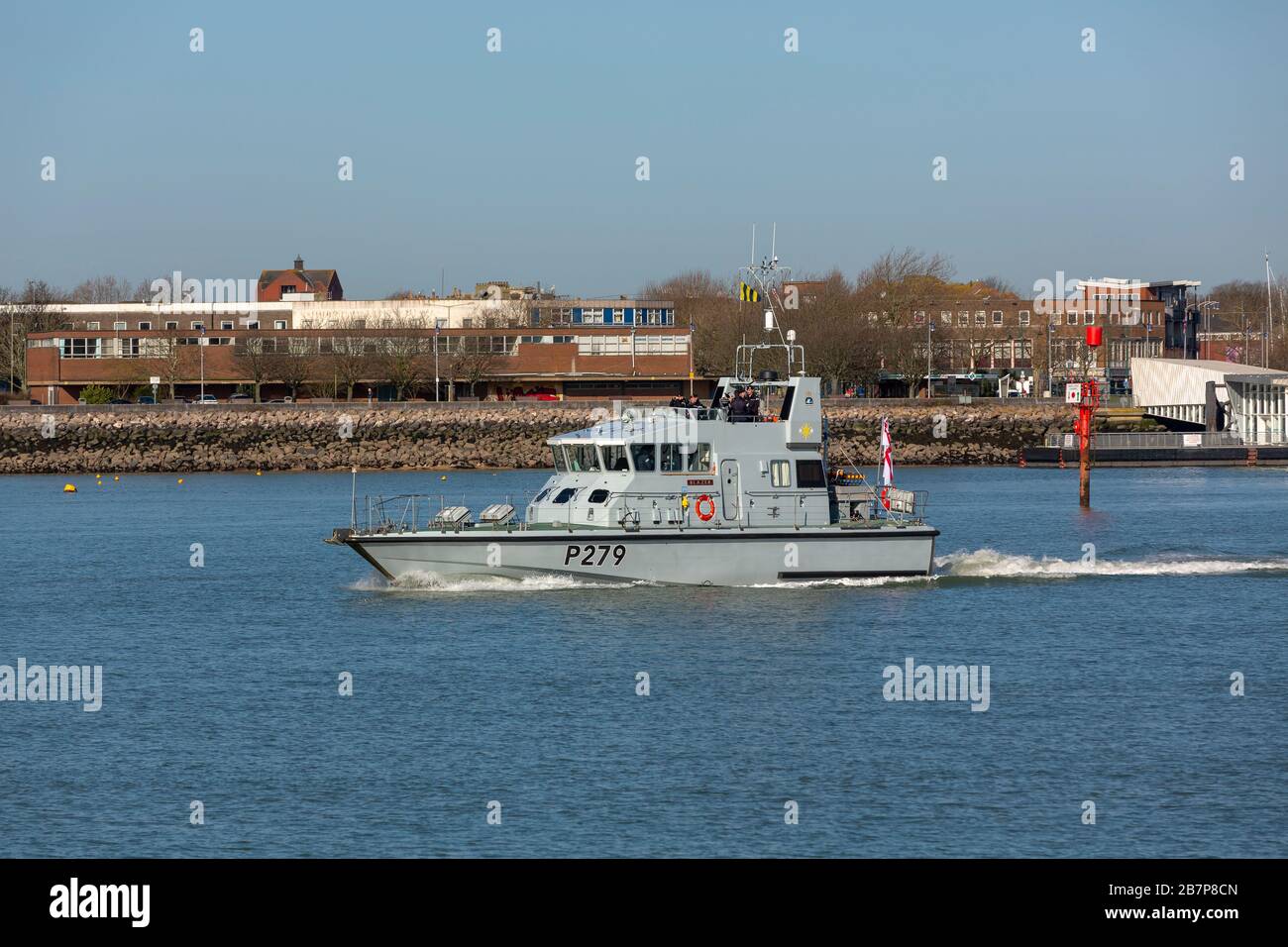 Patrol vessel P279 HMS Blazer leaving Portsmouth harbour at speed Stock ...