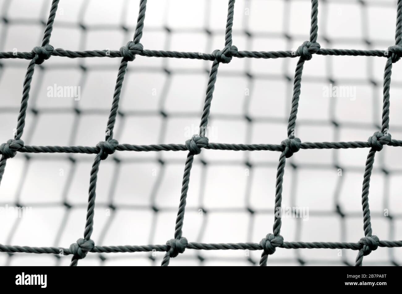 knot rope mesh closeup abstract black and white isolated background ...