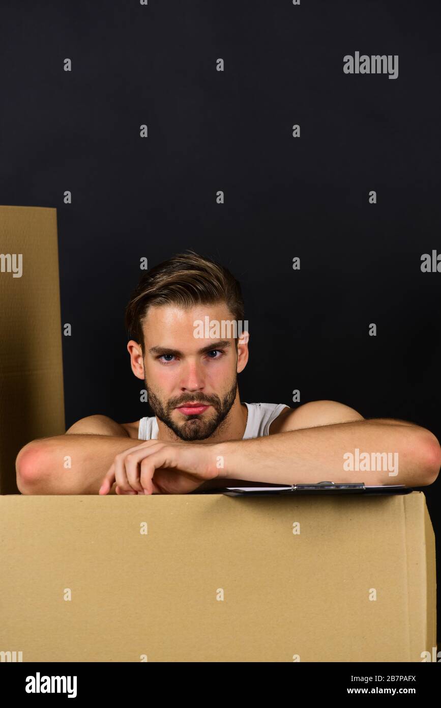 Man leaning on pile boxes hi-res stock photography and images - Alamy