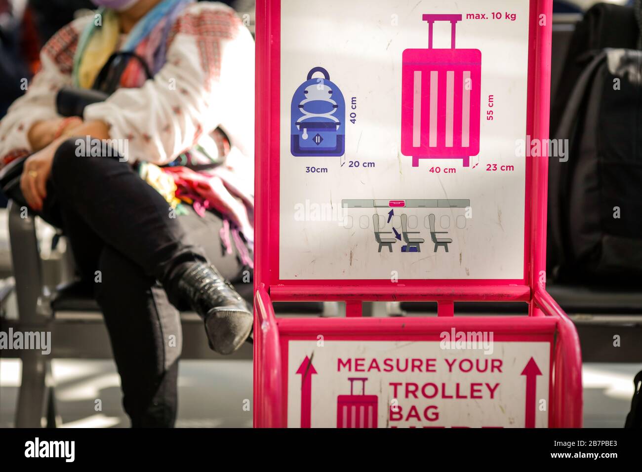 Trolley bag measurements inside an airport Stock Photo - Alamy