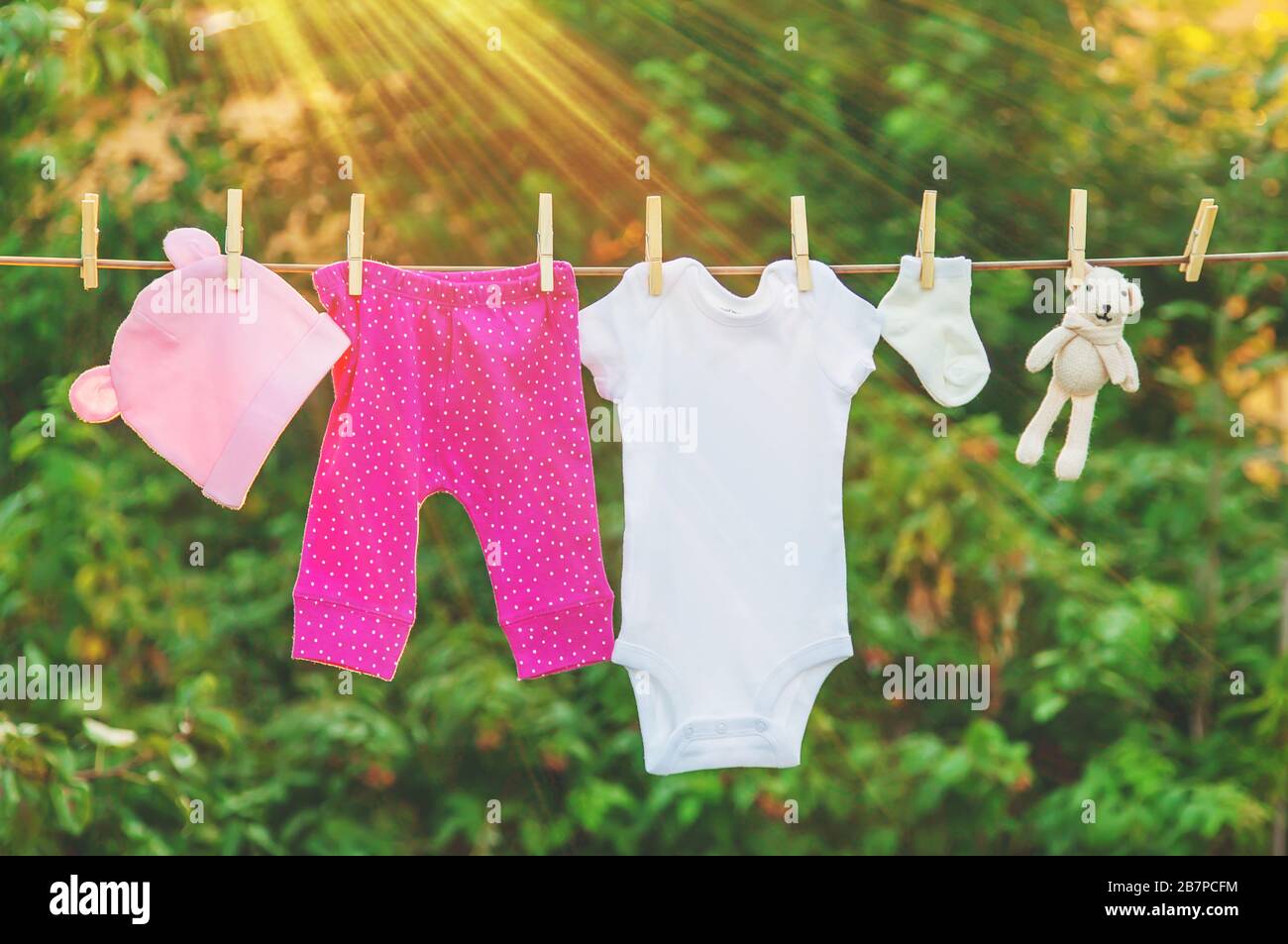 washing baby clothes. Linen dries in the fresh air. Selective focus ...