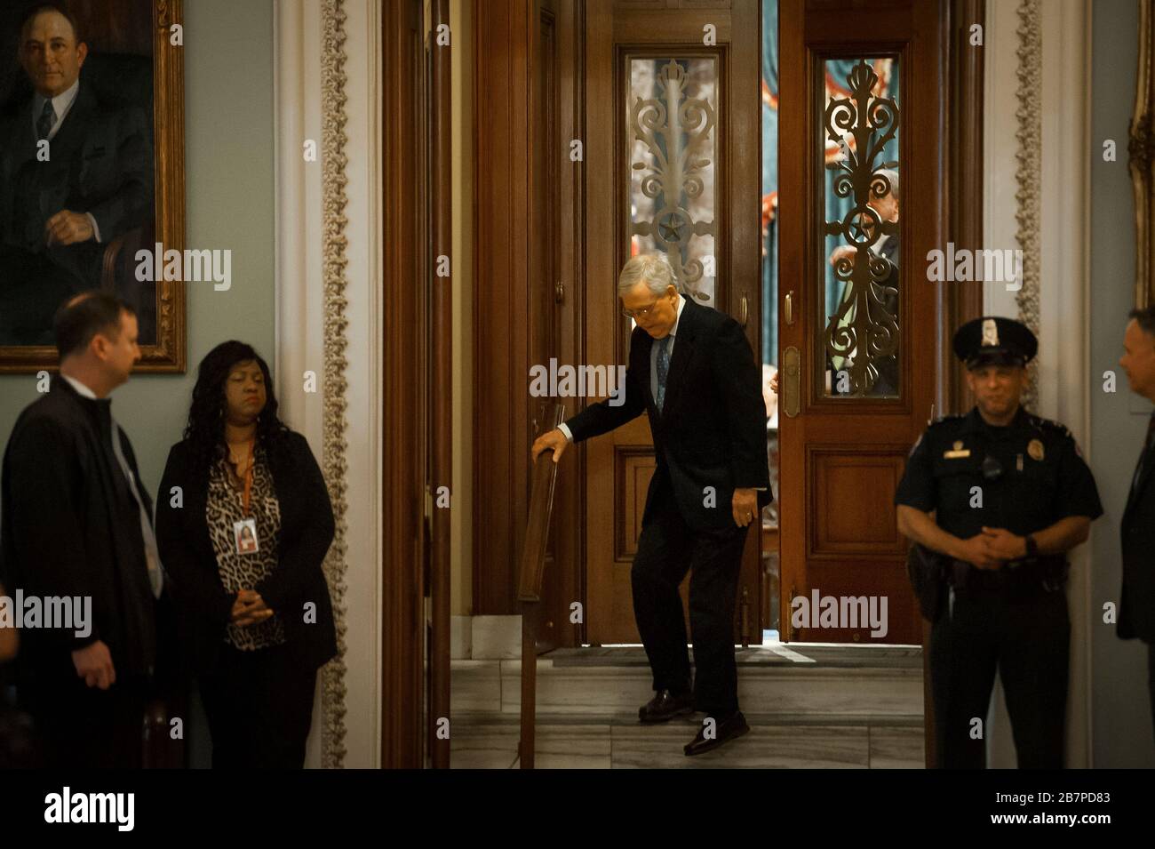 Senate Majority Leader Mitch McConnell (R-KY) makes his way to his ...