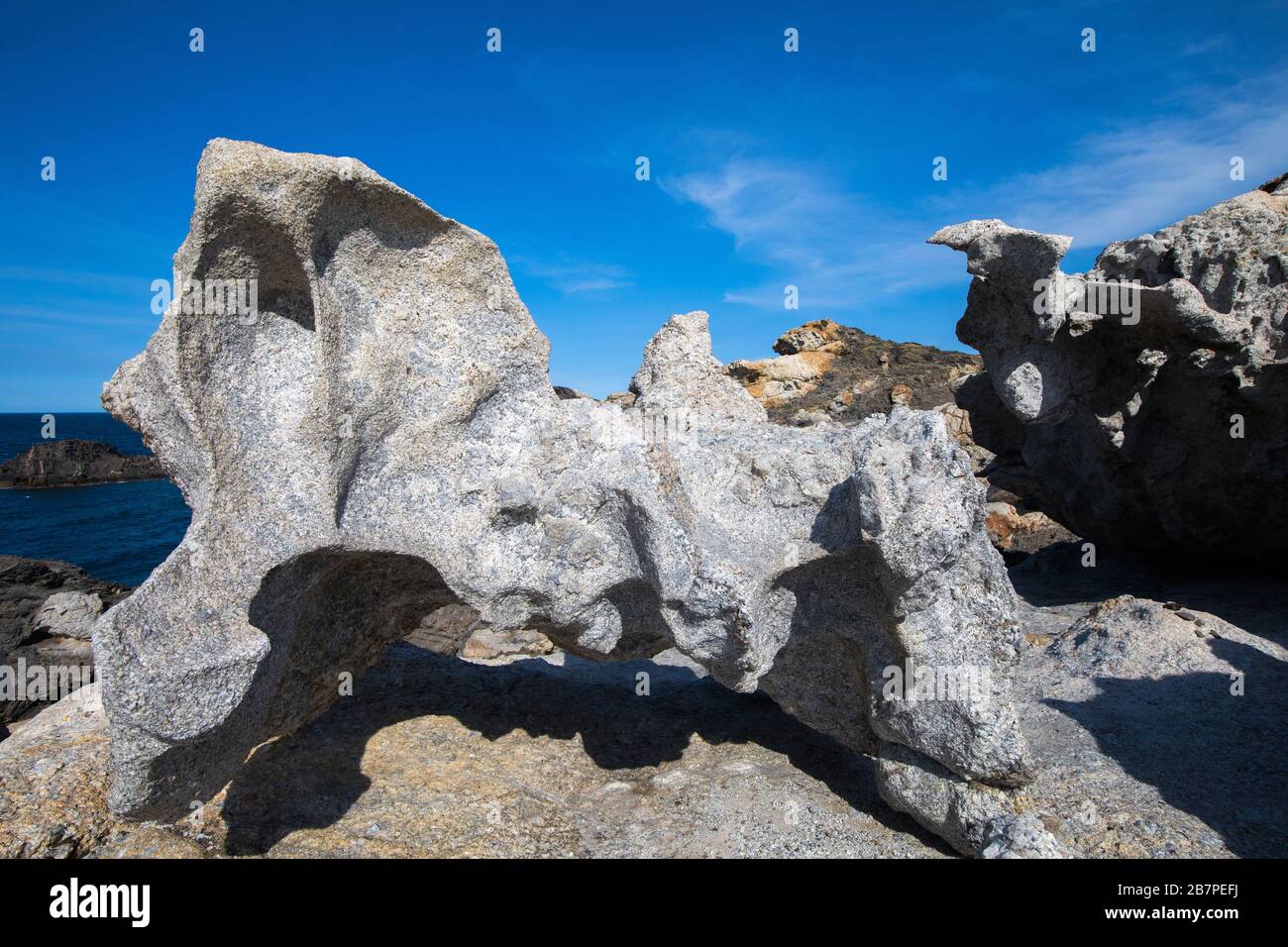 Cala Culleró. The original shaped rock sculpted by the wind and the ...