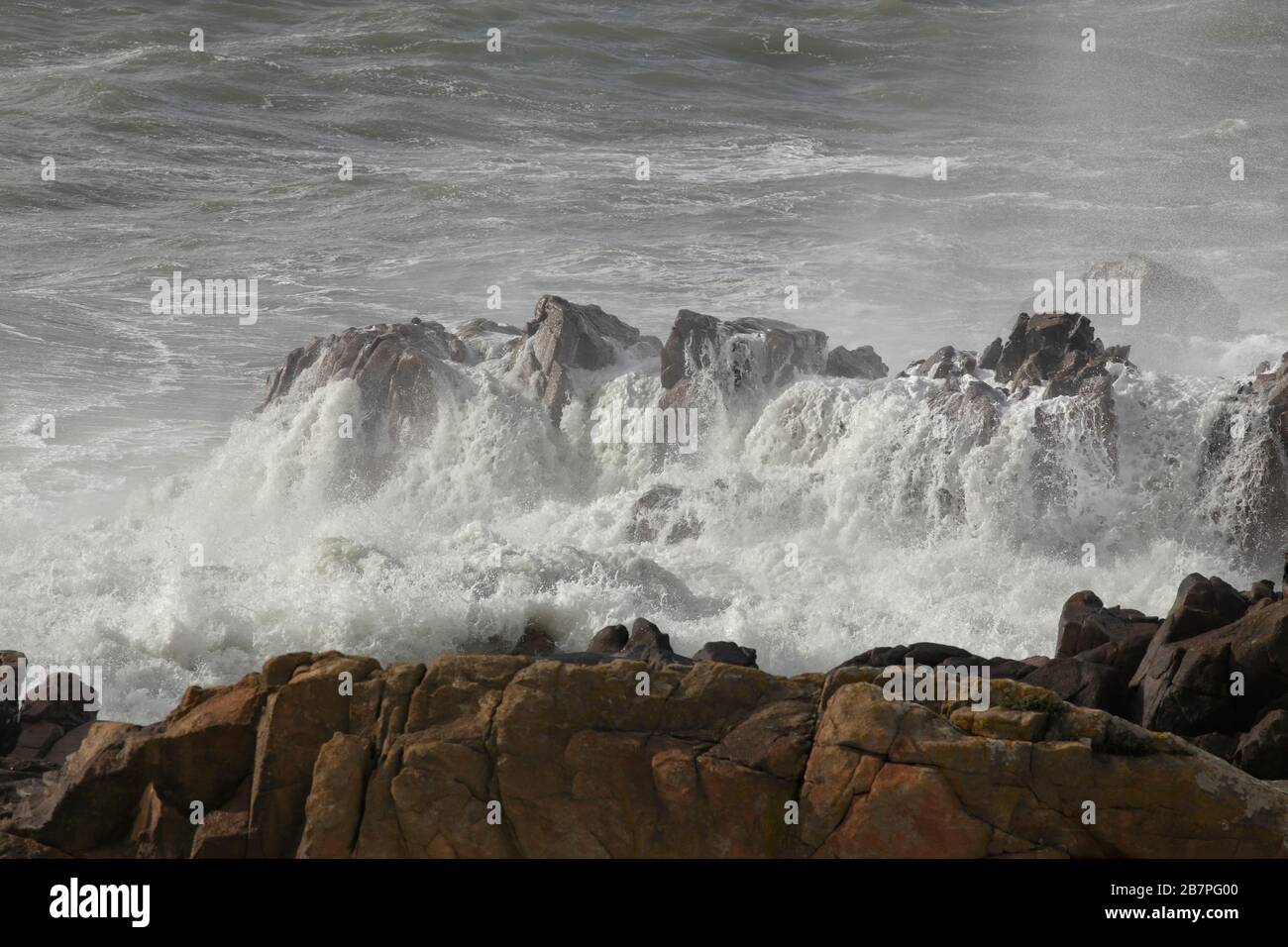 Cascade of sea water on a cliff after being hit by a big wave Stock ...