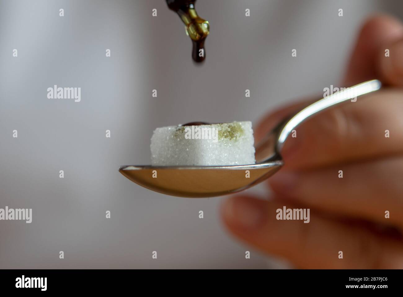 Medicine teaspoon hi-res stock photography and images - Alamy