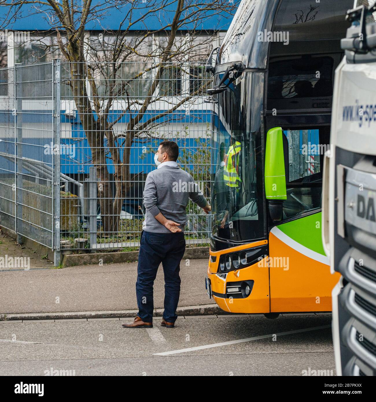 Kehl, Germany - Mar 16, 2020: Driver of intercity bus wearing white ...