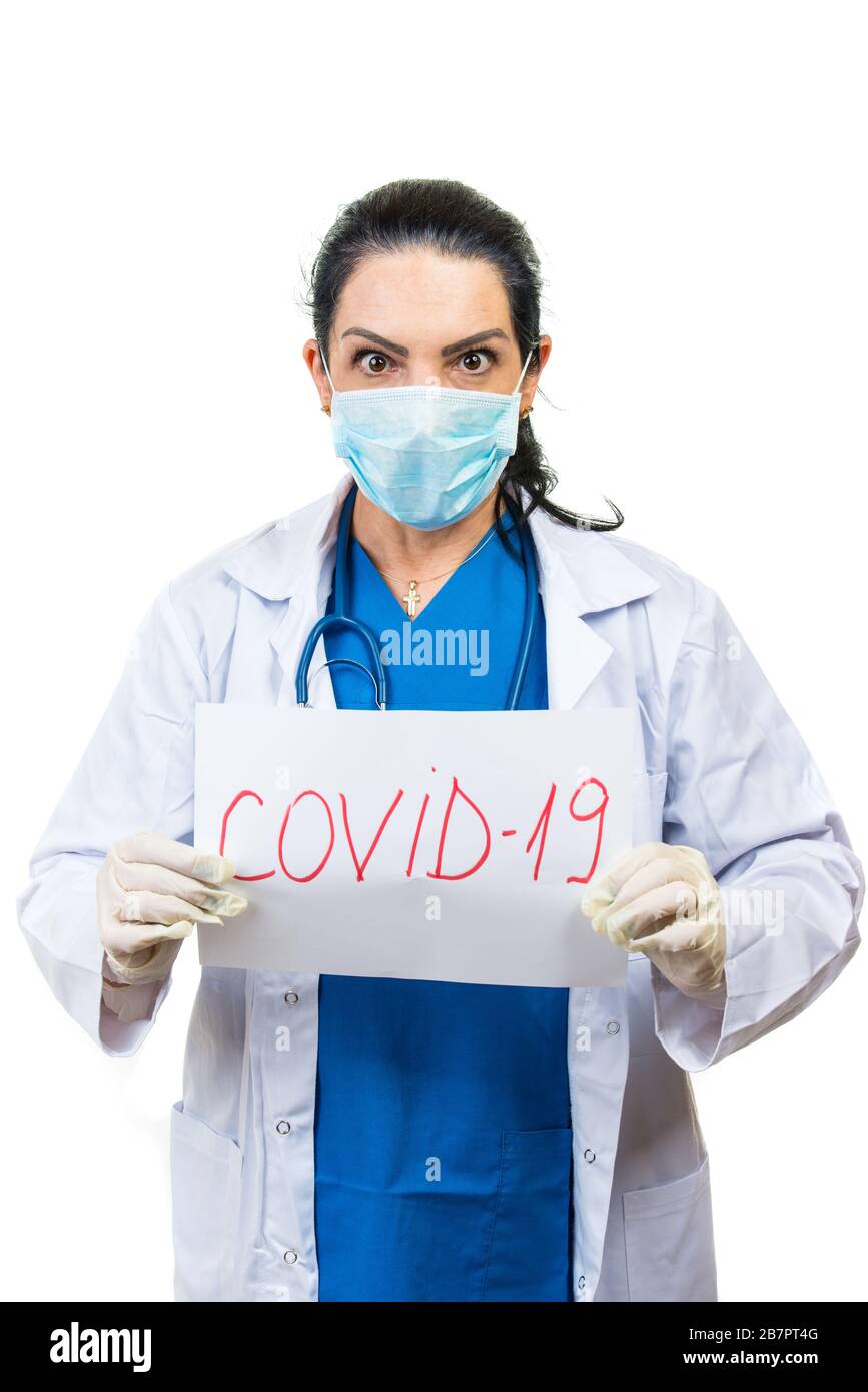 Panic doctor woman with sign Covid-19 isolated on white background ...