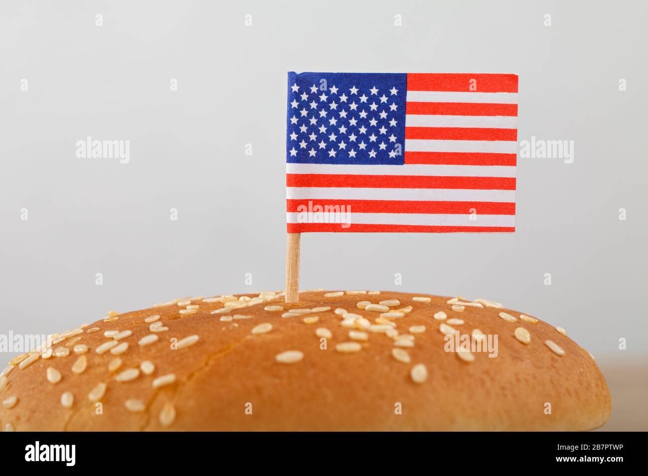 Close up picture of a tasty cheeseburger with beef, cheddar, lettuce in ...