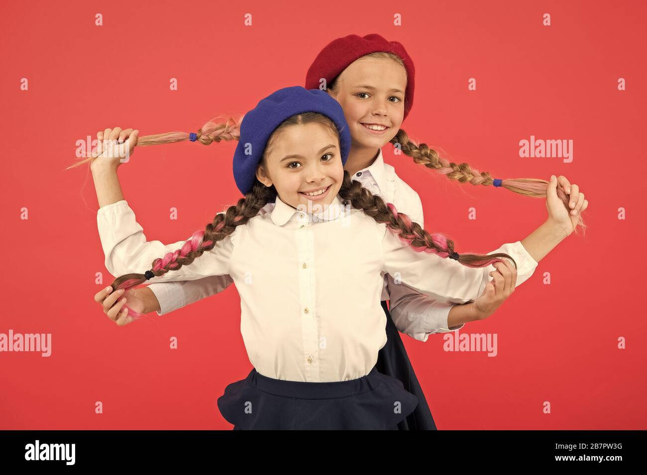 Best braided hairdo. Small girls being proud of long braid hairdo on ...