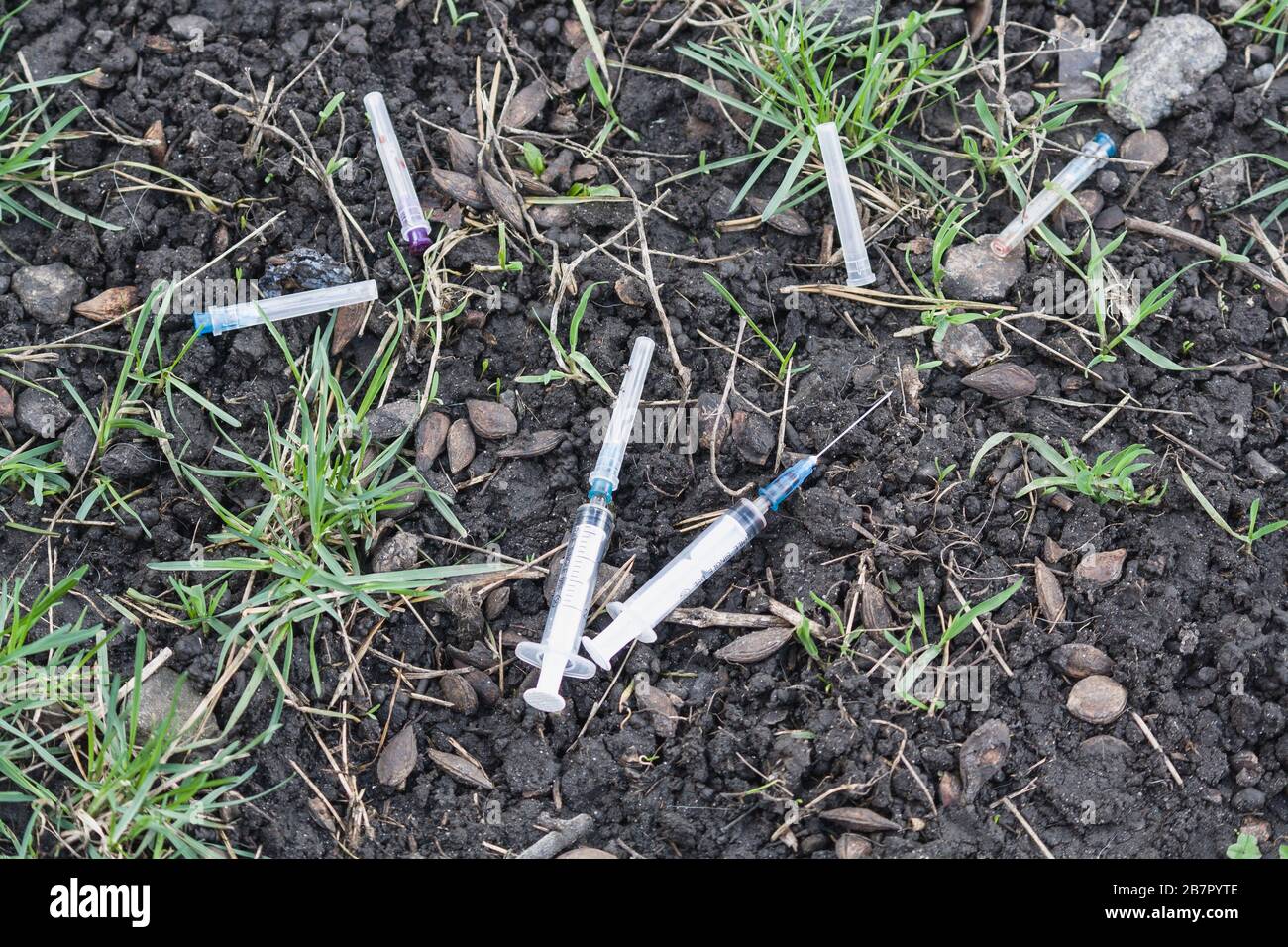 Used syringe with drugs. Danger of addiction Stock Photo - Alamy