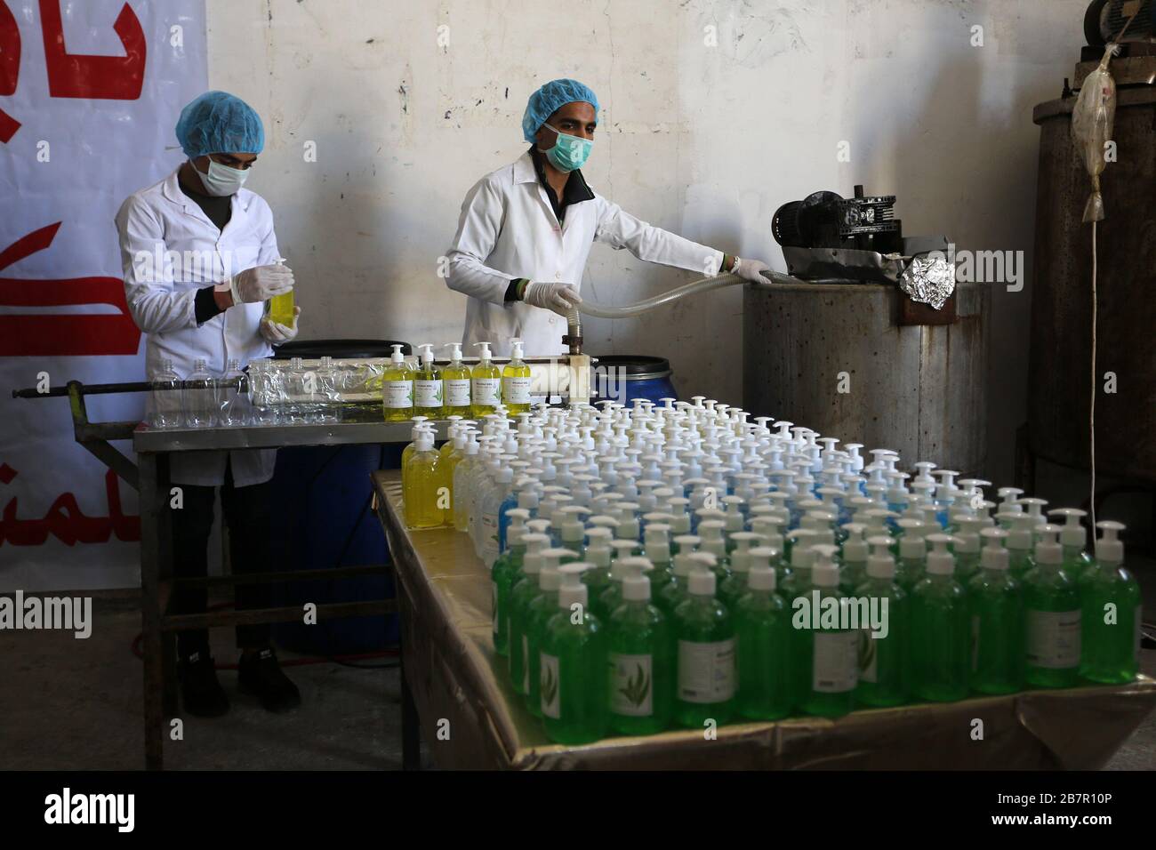 Palestinian workers making Hand Sanitizer Gel at a factory in Khan ...