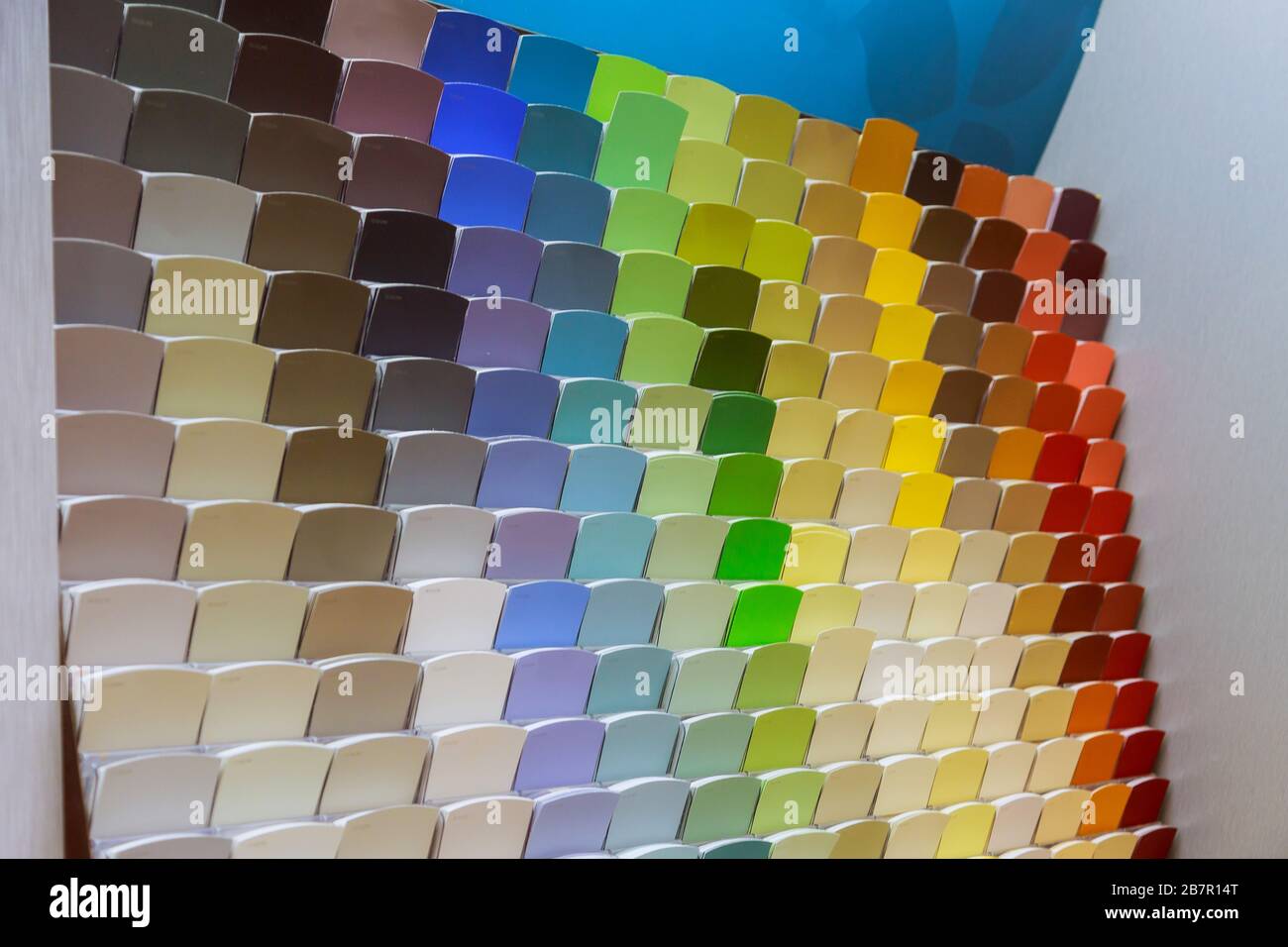 Paint color swatches on display in a painting store shop for interior ...