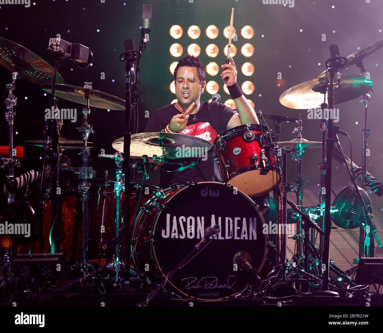 Drummer Rich Redmond performs with Jason Aldean and the rest of the ...