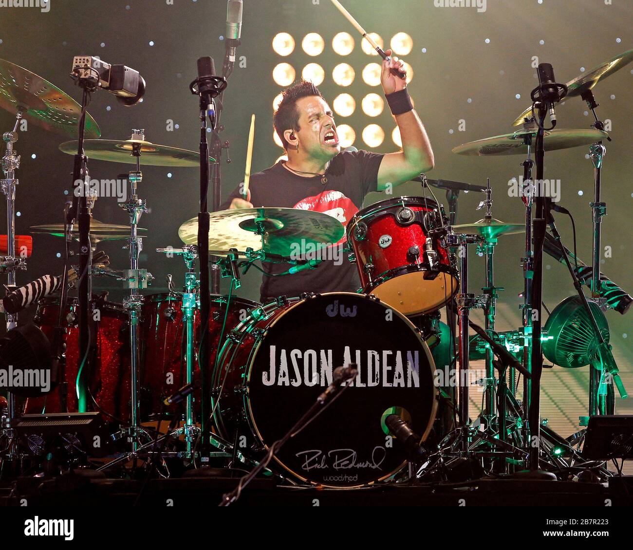 Drummer Rich Redmond performs with Jason Aldean and the rest of the ...