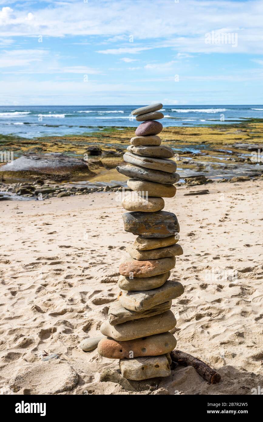 A stack of stones on a beach. Sunset Cliffs Natural Park, San Diego, CA ...