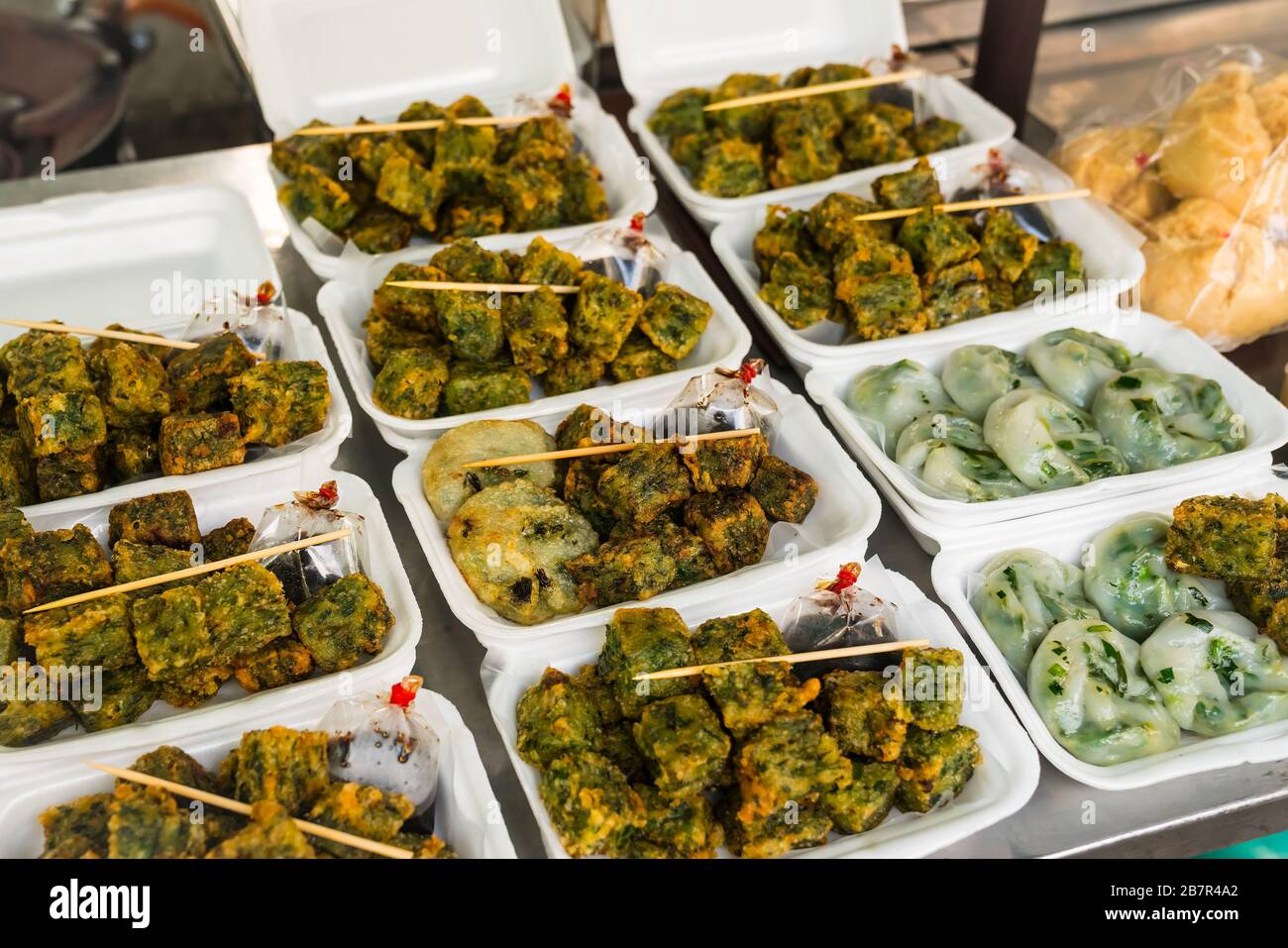 Close up view of Stinky tofu as snack on roadside Stock Photo - Alamy