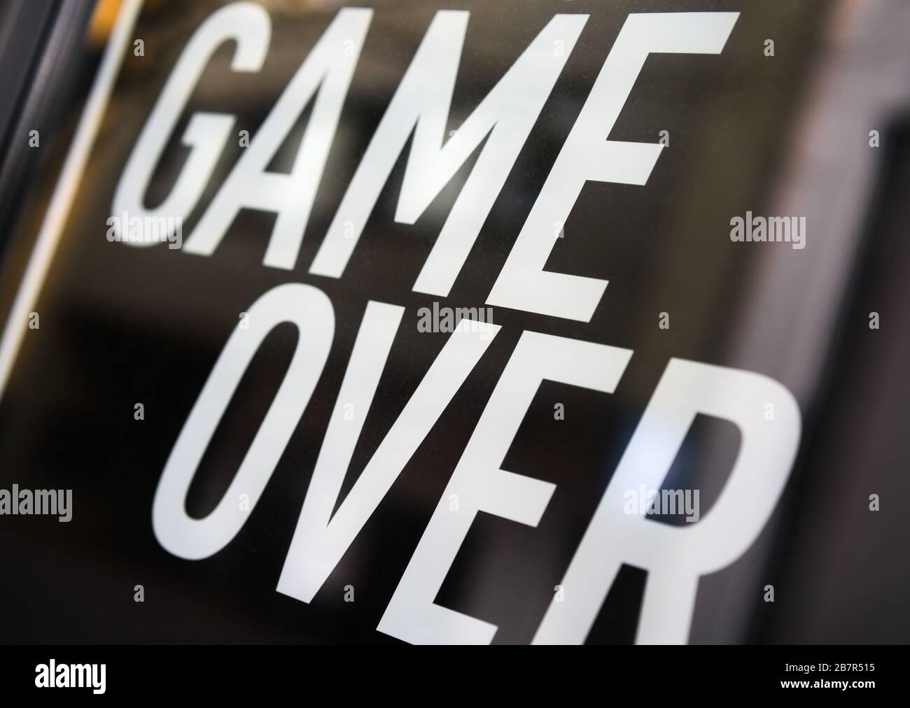 Game over notification in closing retail store display Stock Photo - Alamy