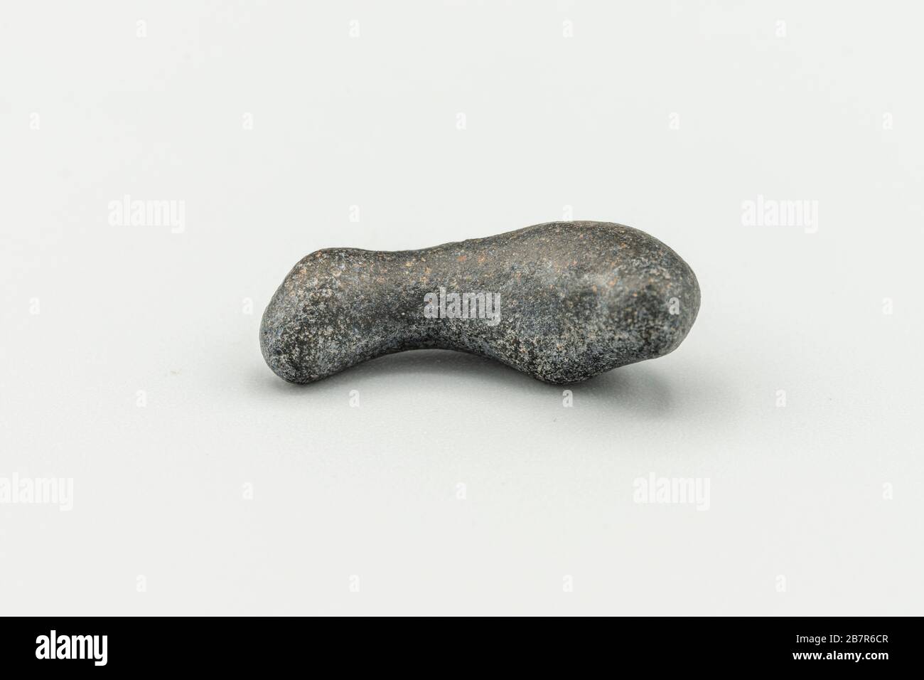 Black magnetic Atacaimite Tektite Meteorite isolated, a rock formed in ...