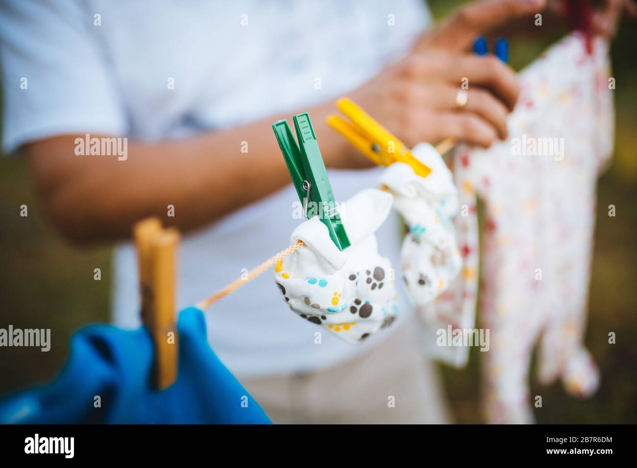 Childrens clothes on washing line hi-res stock photography and images ...