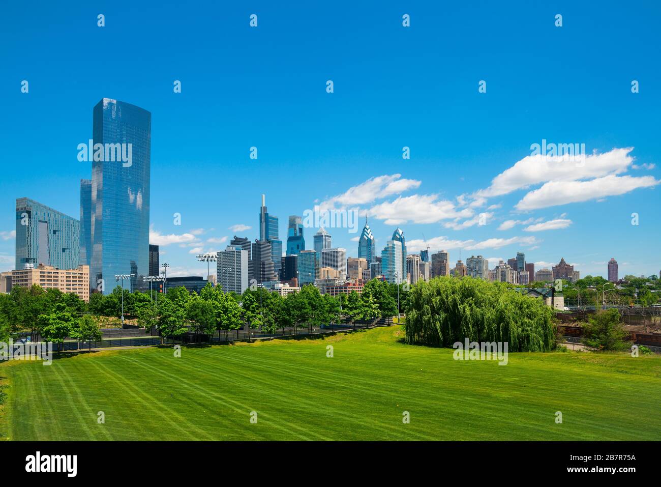 Philadelphia downtown skyline with blue sky and white cloud Stock Photo ...