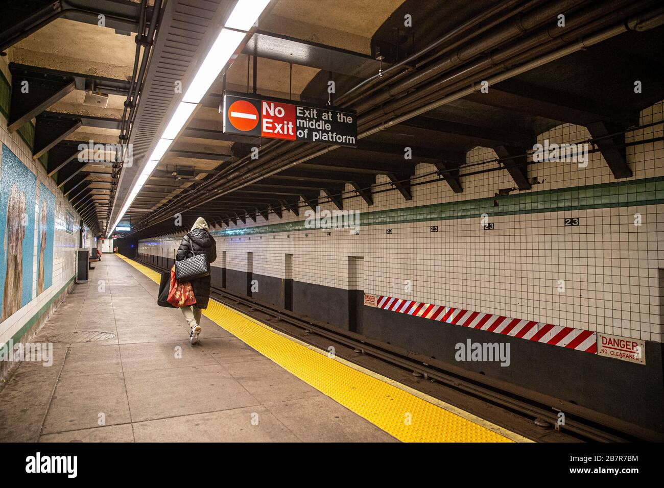 A subway station in New York City is near empty during the morning ...