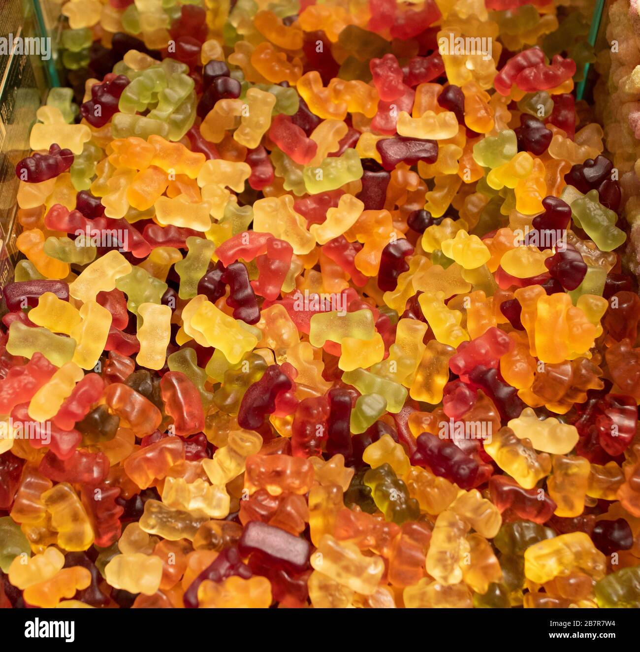 Candies of different types and colors close up. Photographed in front ...