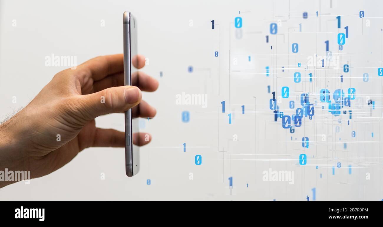 Businessman presenting a virtual projection of a digital code Stock ...