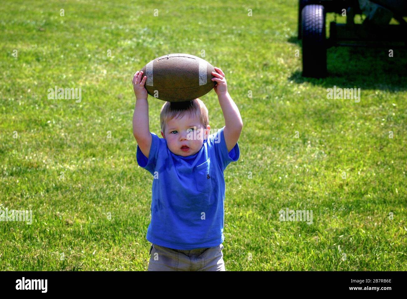 Kids playing football head hi-res stock photography and images - Alamy