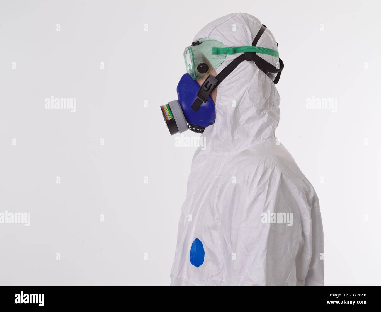 Doctor wearing protective biological suit and mask due to coronavirus ...