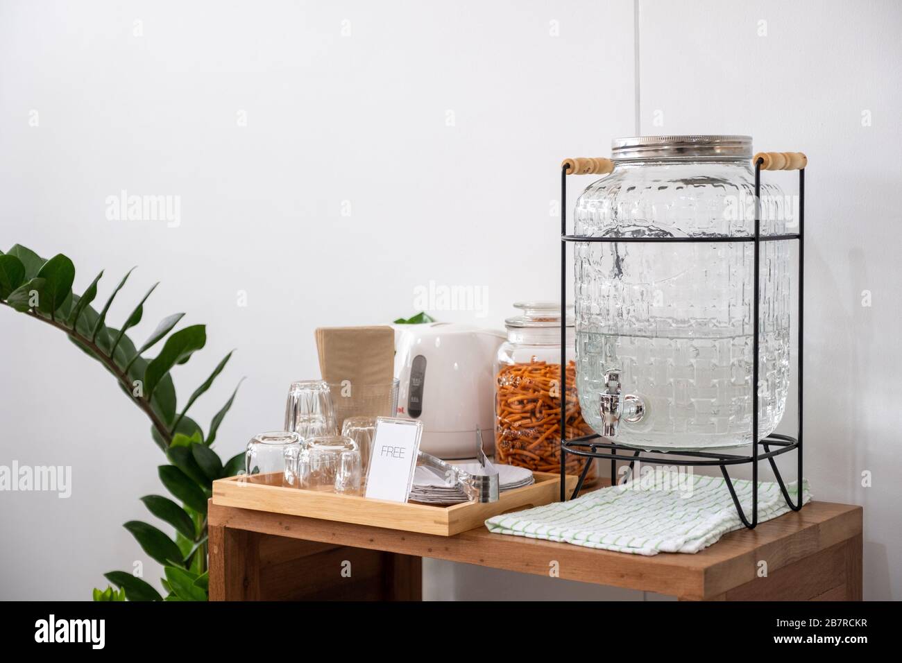 Drinking water and snacks set in cafe Stock Photo - Alamy