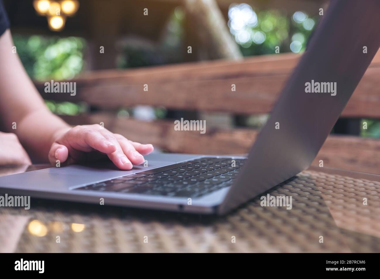 Woman hands using laptop touchpad hi-res stock photography and images ...