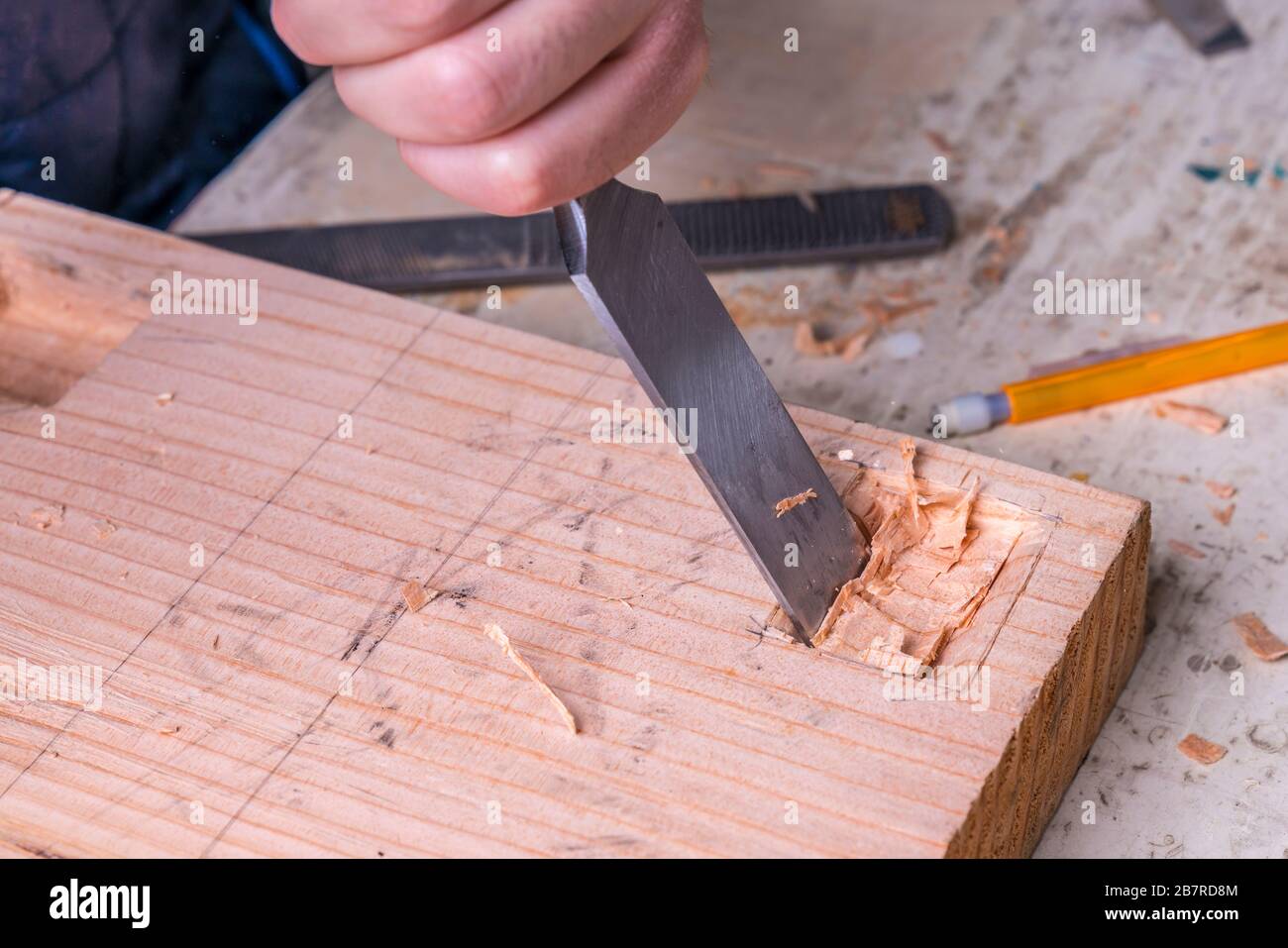 Chisel and hand hi-res stock photography and images - Alamy