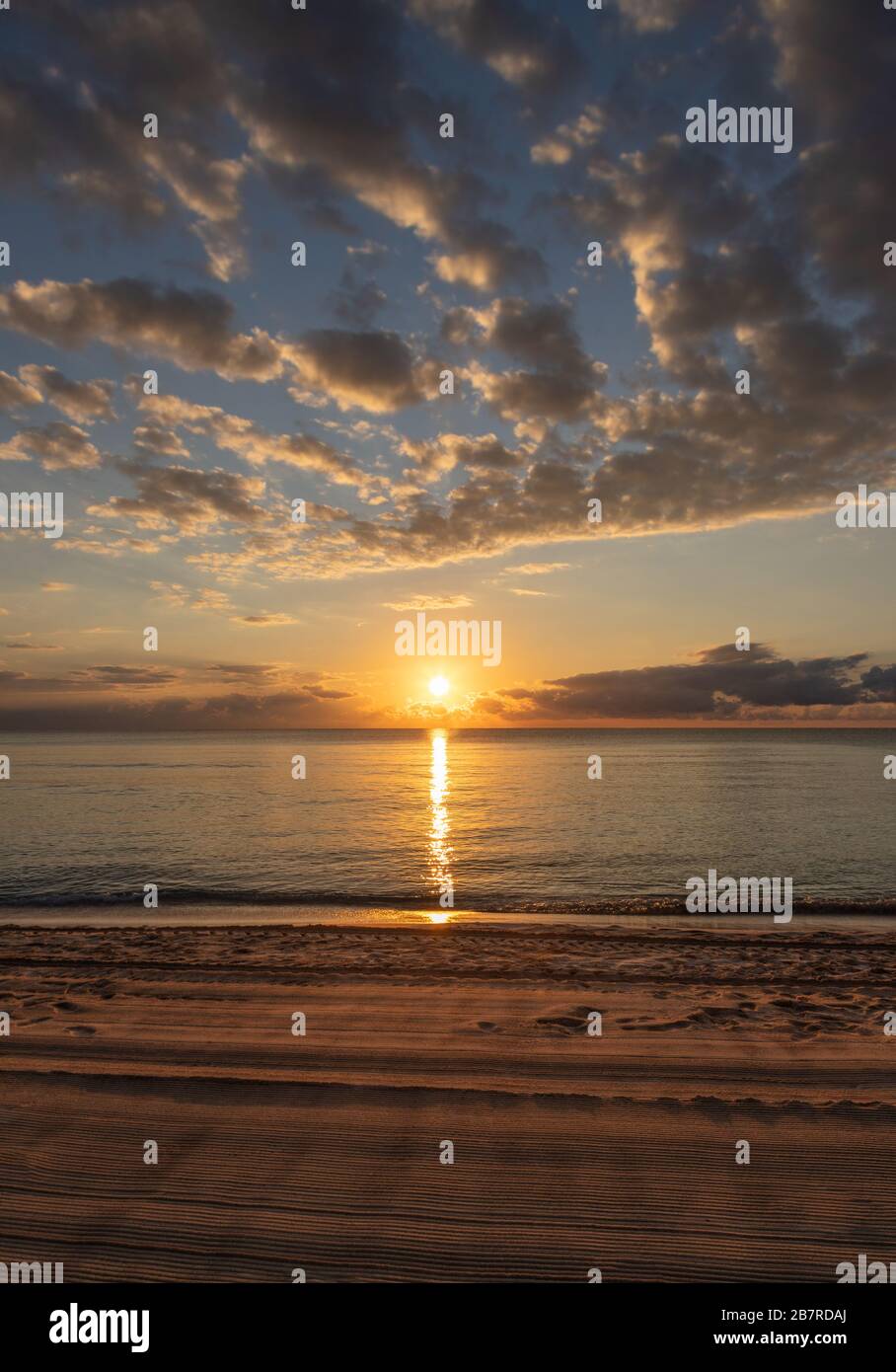 Beautiful sunrise by the beach at Cancun, Mexico, with golden ...