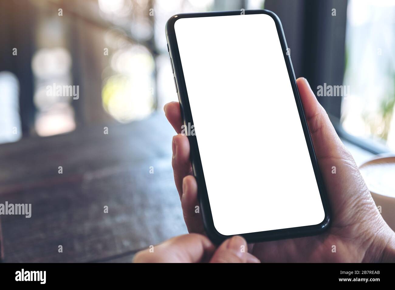 Hand holding phone vintage phone hands hi-res stock photography and ...