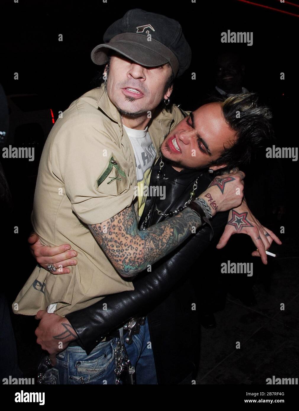 Tommy Lee and Lukas Rossi of Supernova all over each other outside of ...
