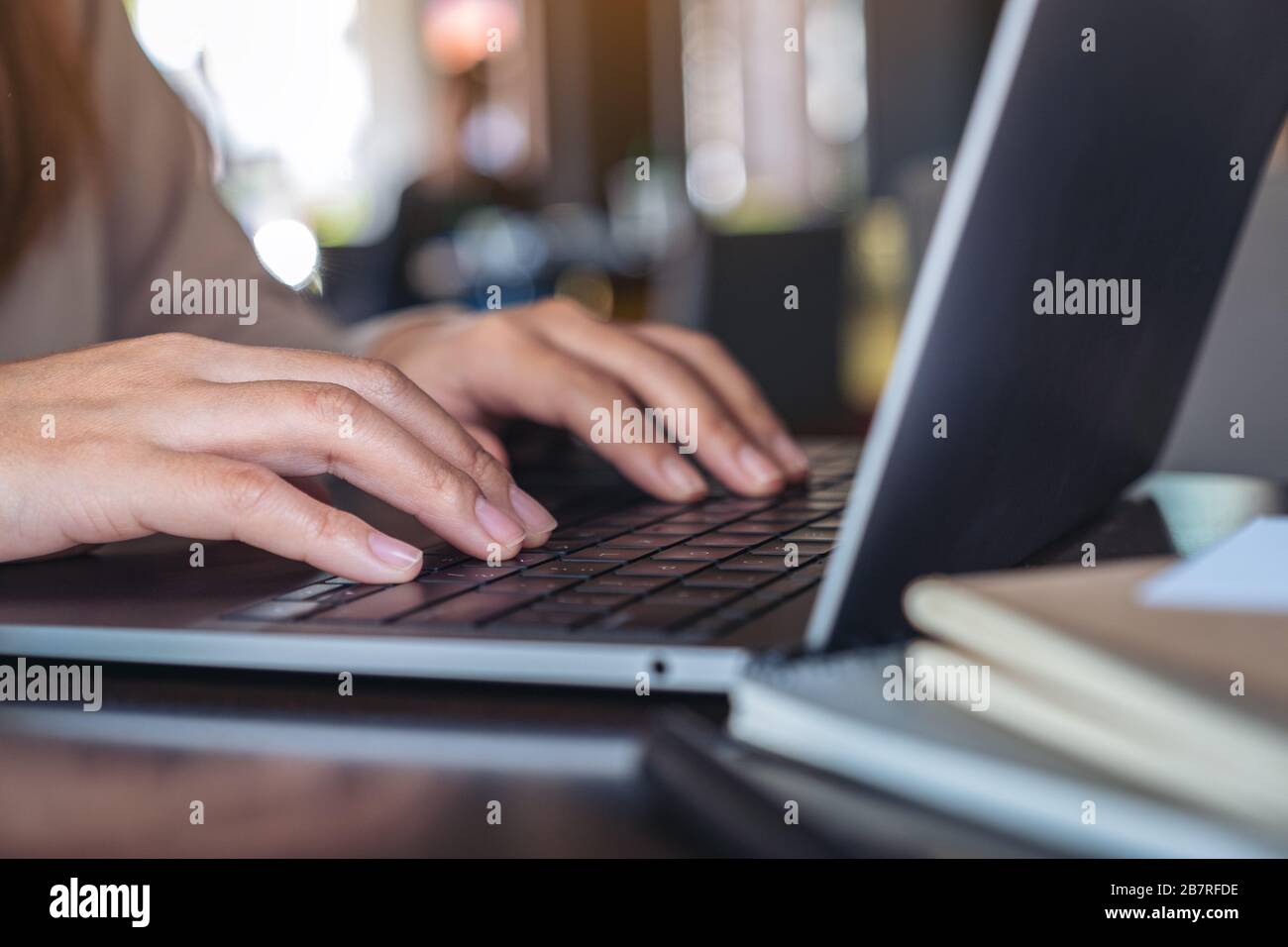 Closeup image of hands using and typing on laptop keyboard Stock Photo ...