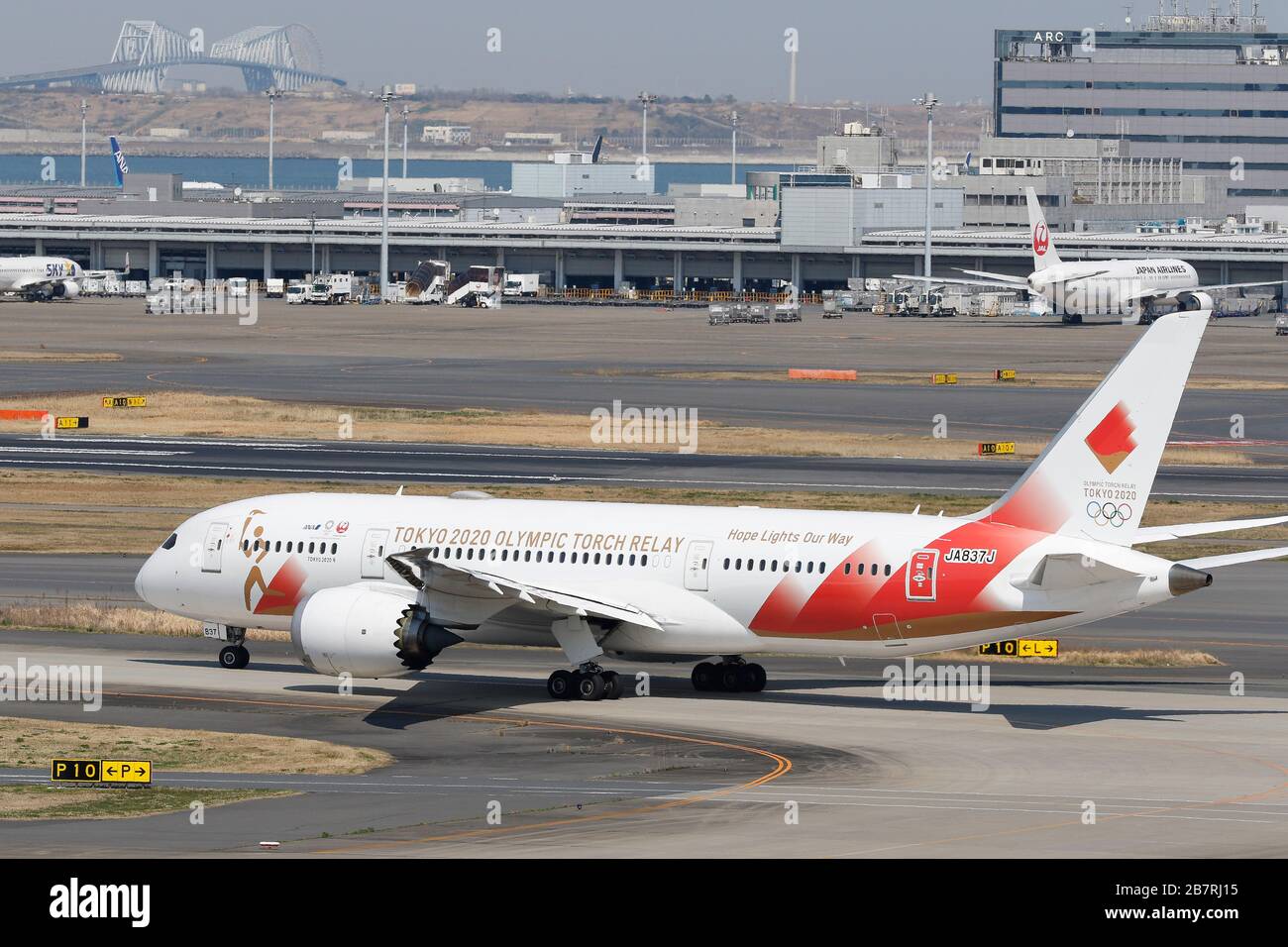 The Olympic Torch Special ''Tokyo 2020'' Aircraft is seen at Haneda ...