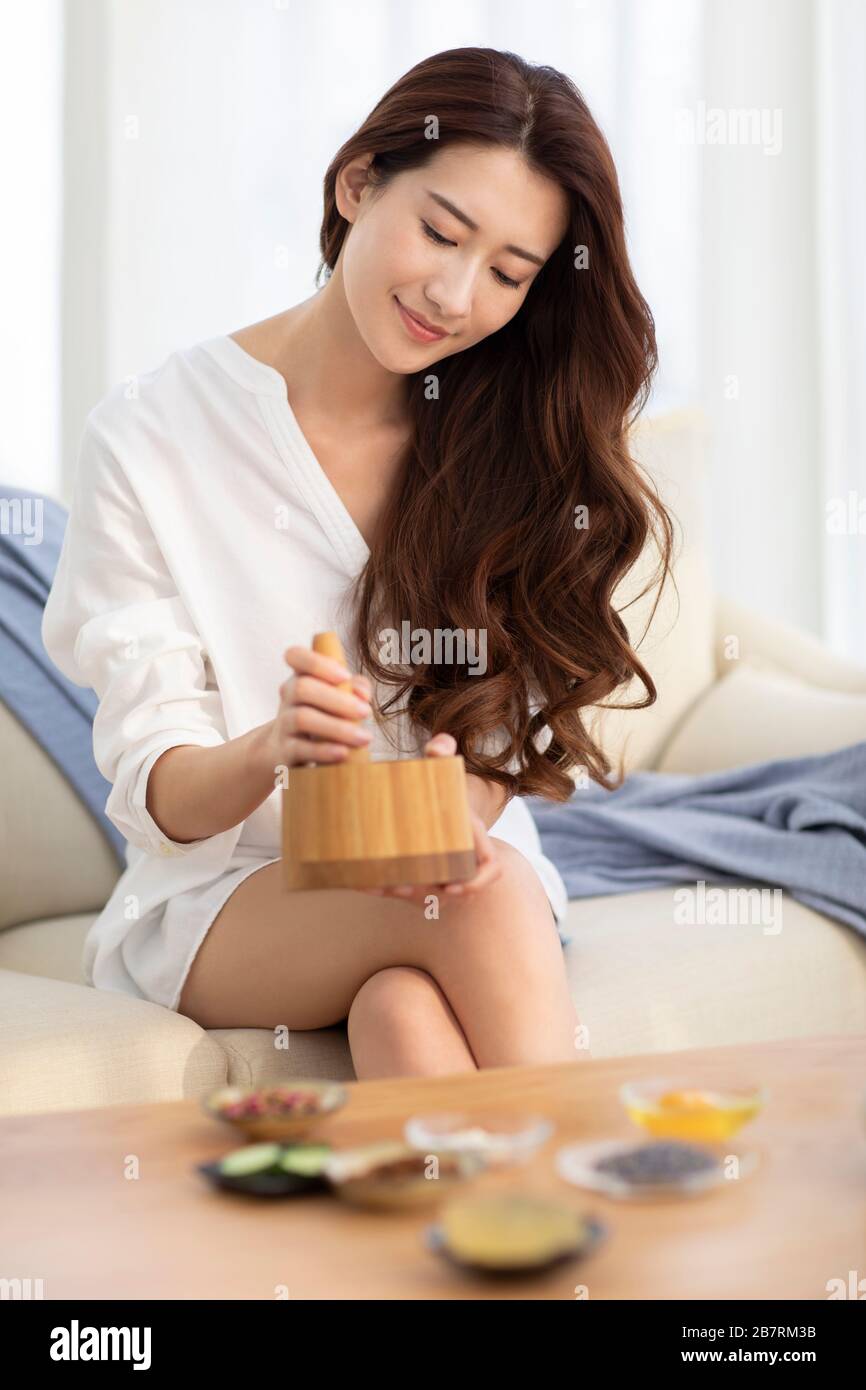 Young Chinese woman and skin care Stock Photo - Alamy