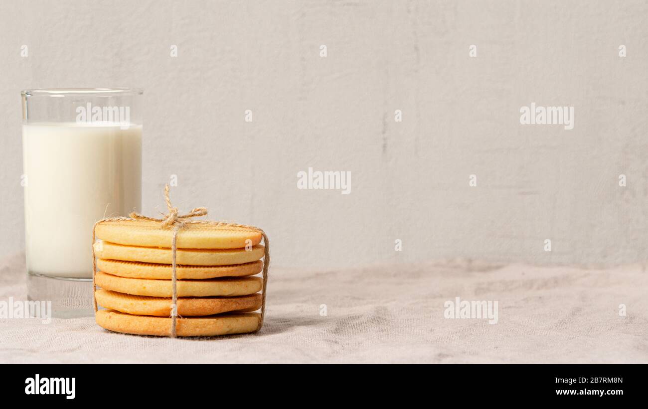 Stack of homemade cookies twisted with a rope. Healthy snack for kids ...