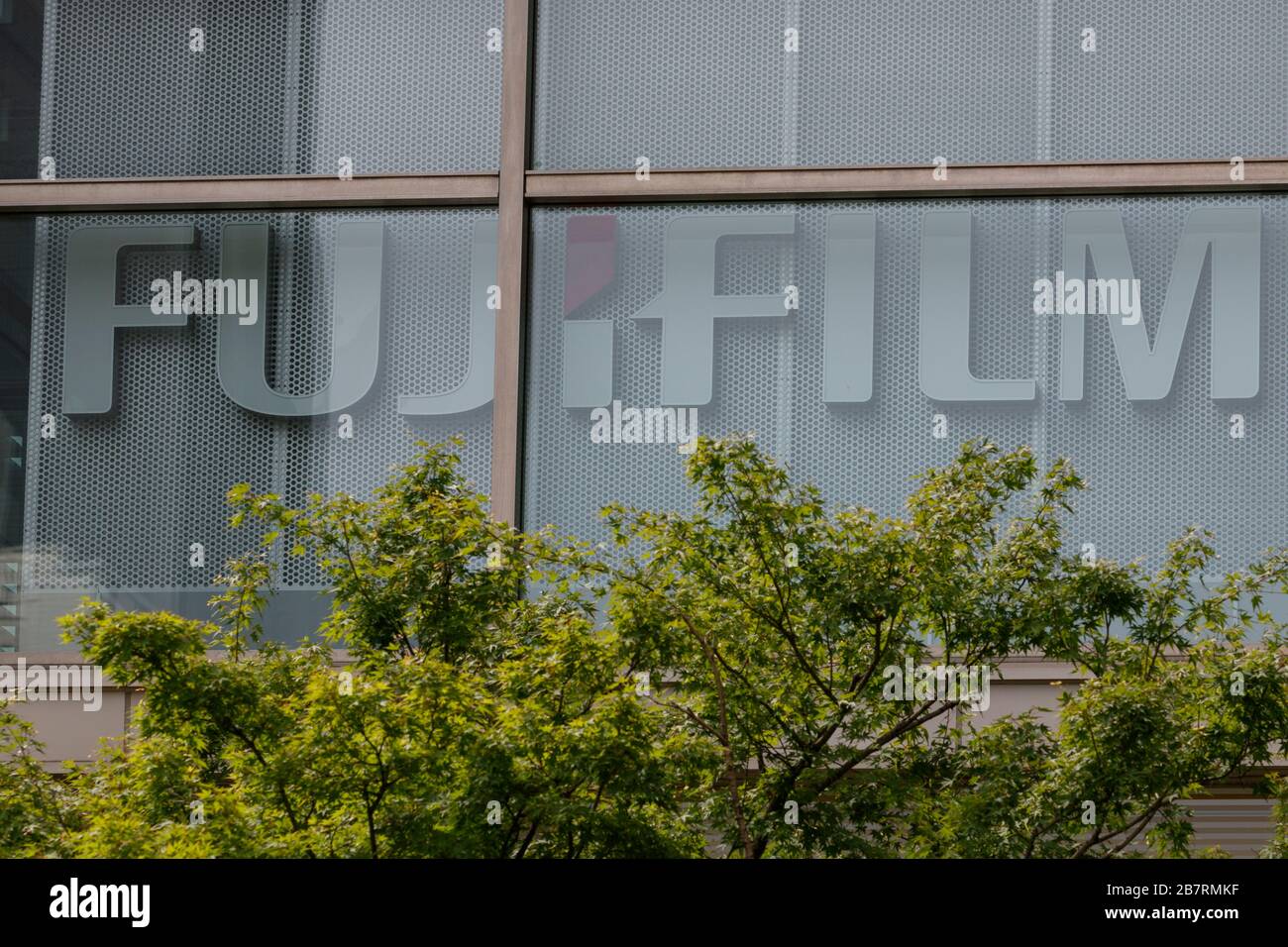 FILE : A signboard of Japan's Fujifilm Holdings on display outside its ...