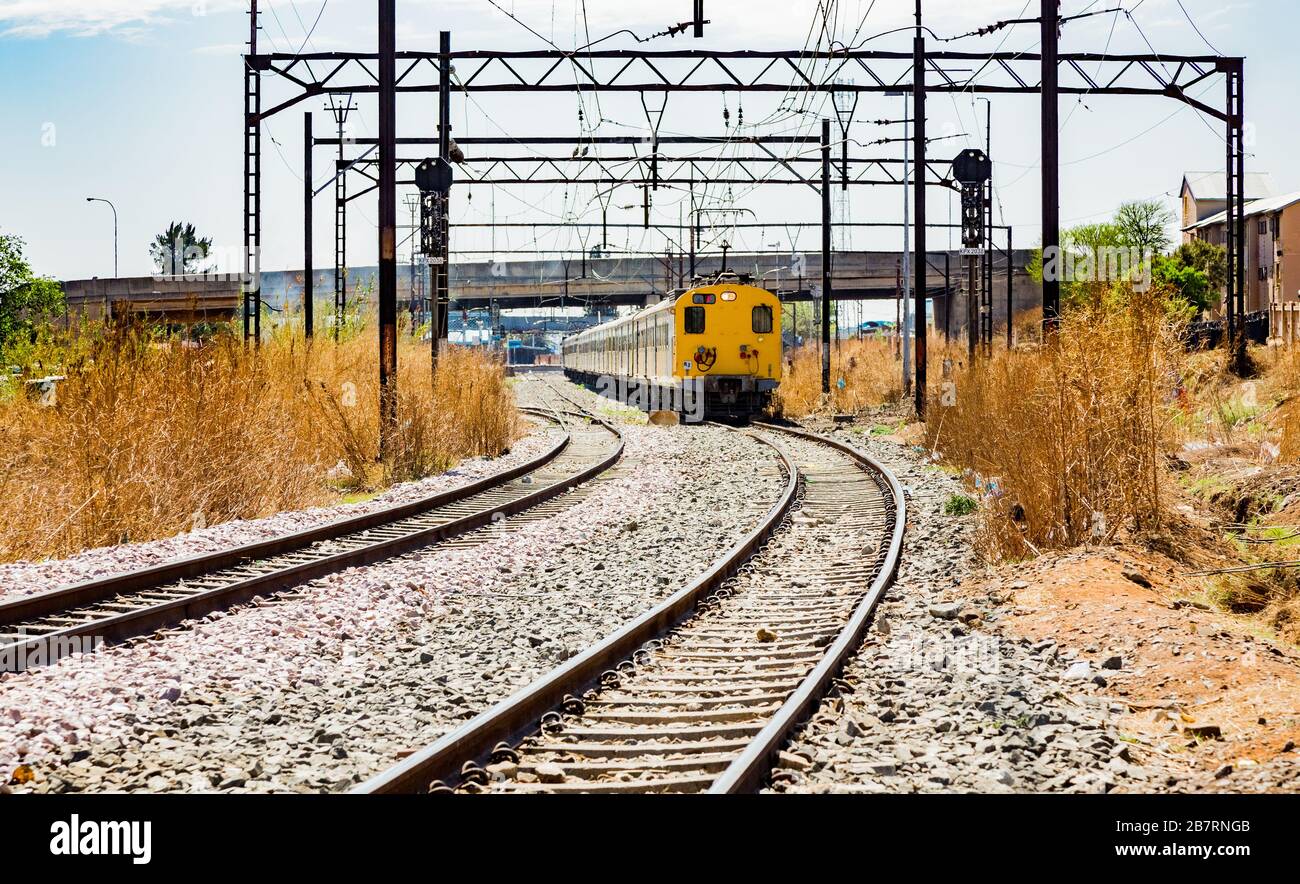 Soweto, South Africa - September 08 2018: Commuter Train moving through ...