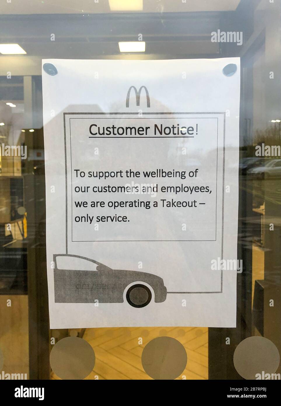 A customer notice on the door of a McDonald's restaurant in Leicester ...