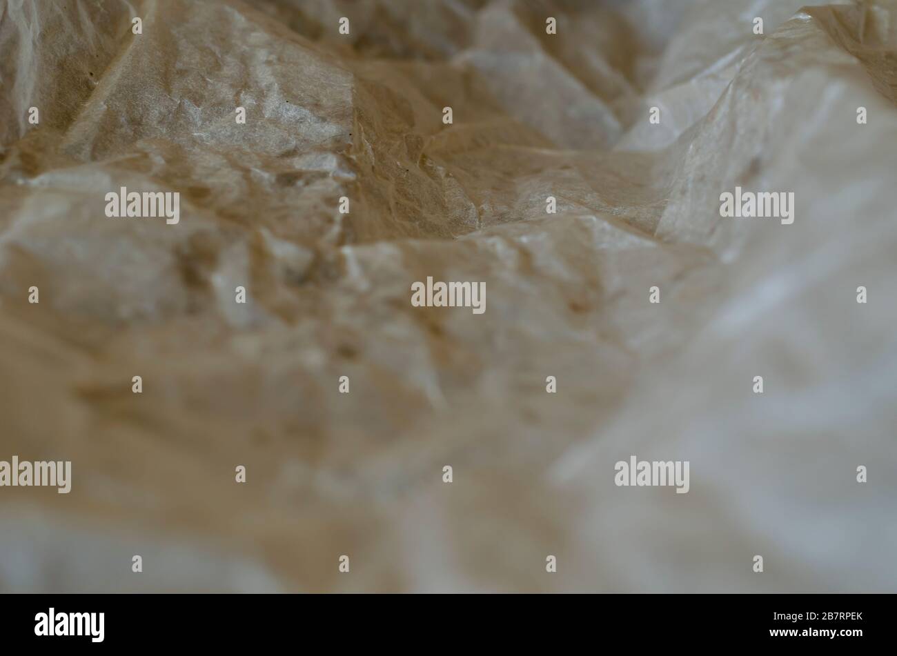 The texture of dirty crumpled paper. Light paper in a receding ...