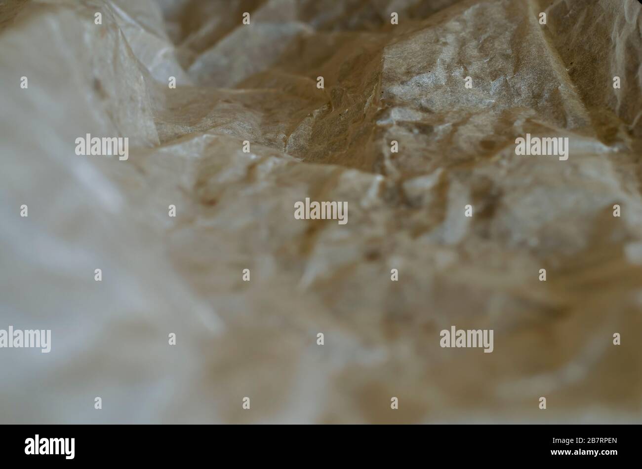 The texture of dirty crumpled paper. Light paper in a receding ...
