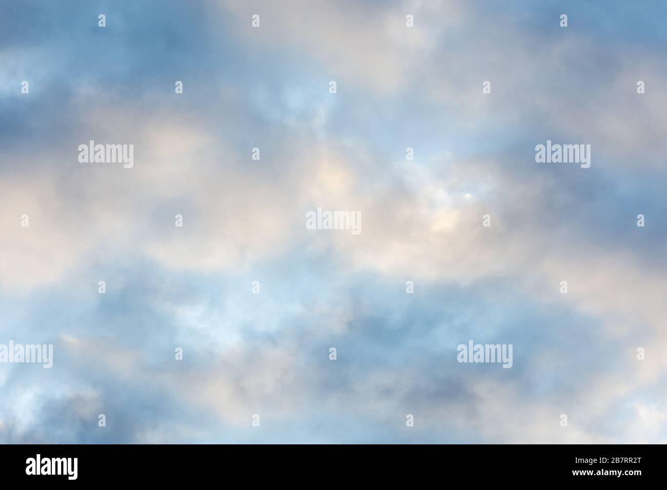 texture of a colorful sky with clouds and sun Stock Photo - Alamy