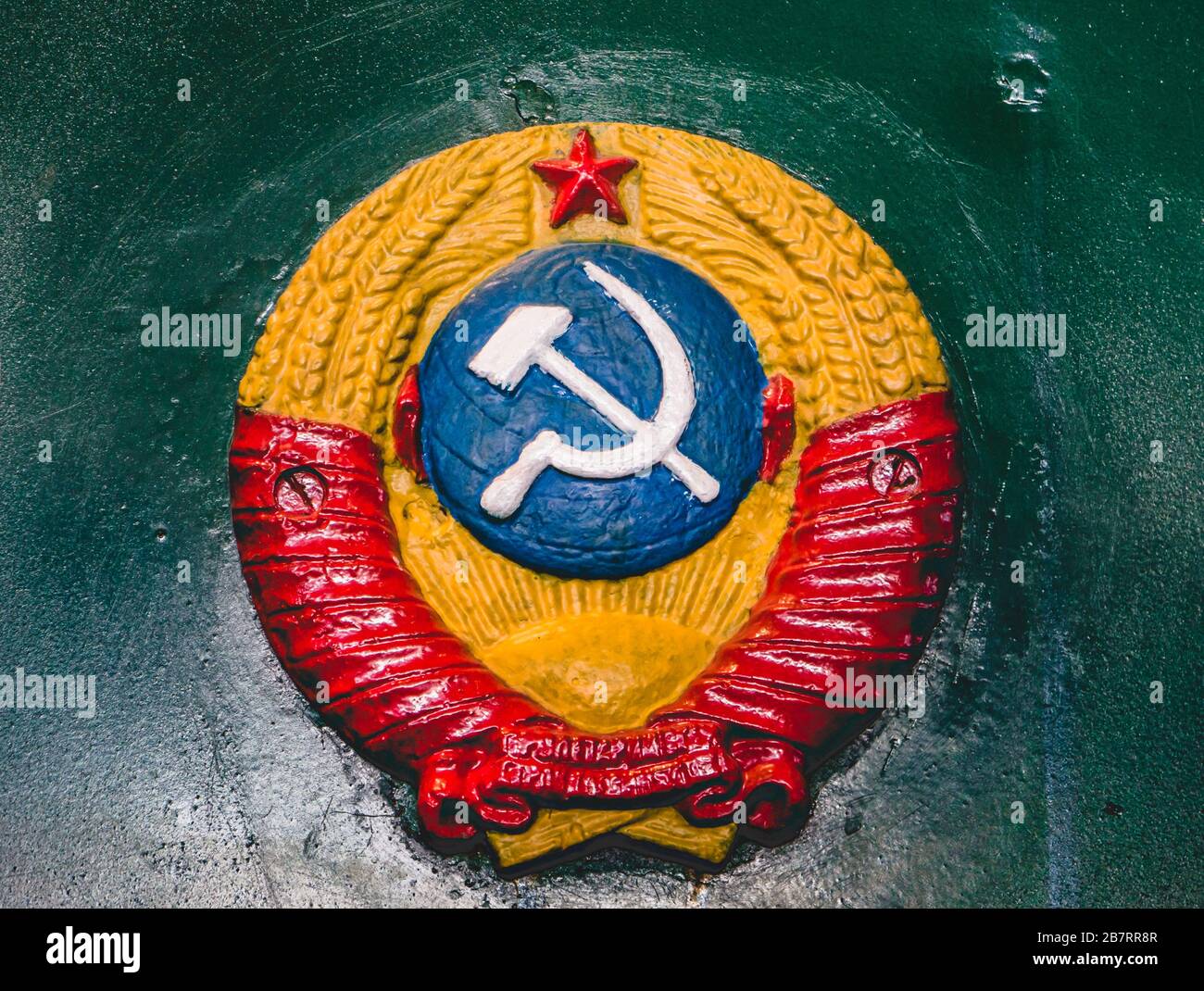 Old retro former Soviet Union coat of arms on wall of train locomotive ...