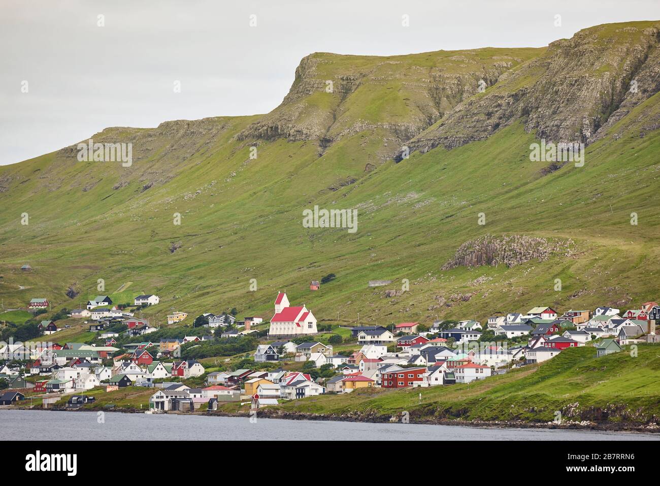 Traditional faroese village in Suduroy island. Fjord landscape ...