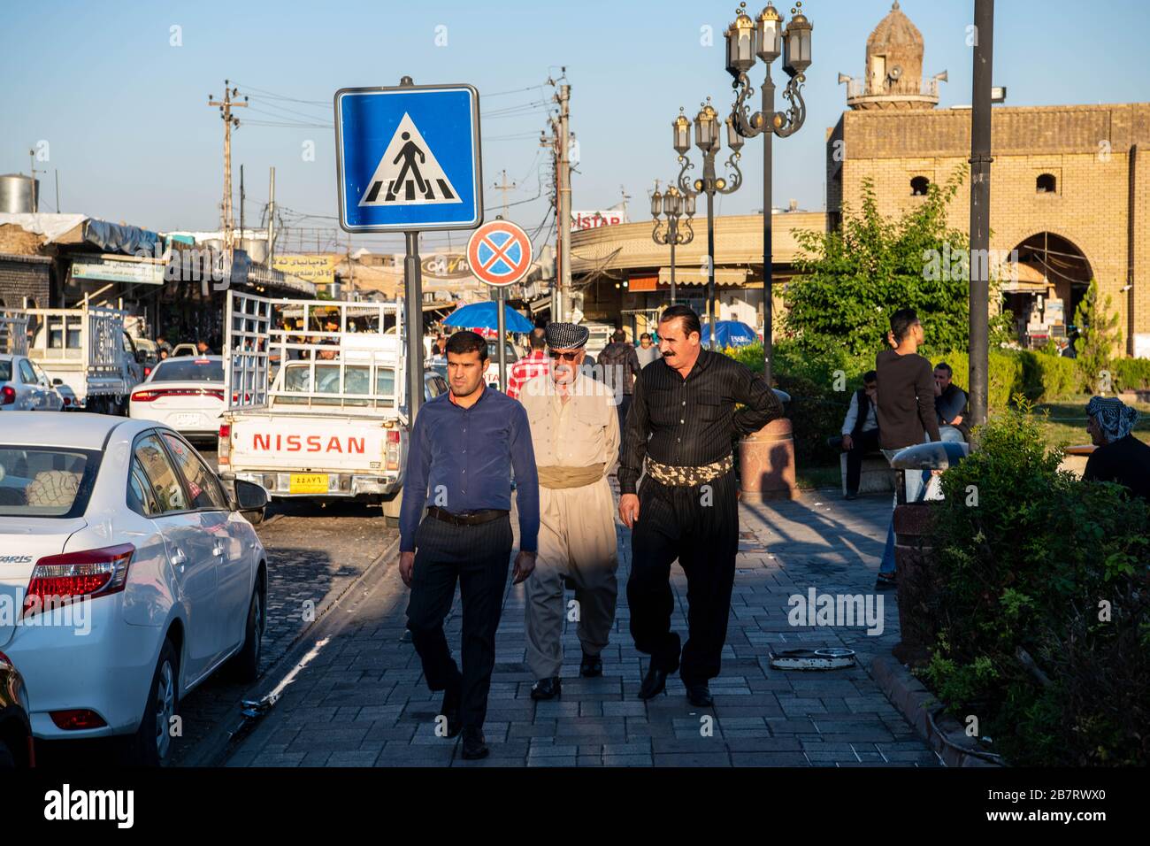 Iraq, Iraqi Kurdistan, Erbil. Next to the park Shar, three iraqi ...