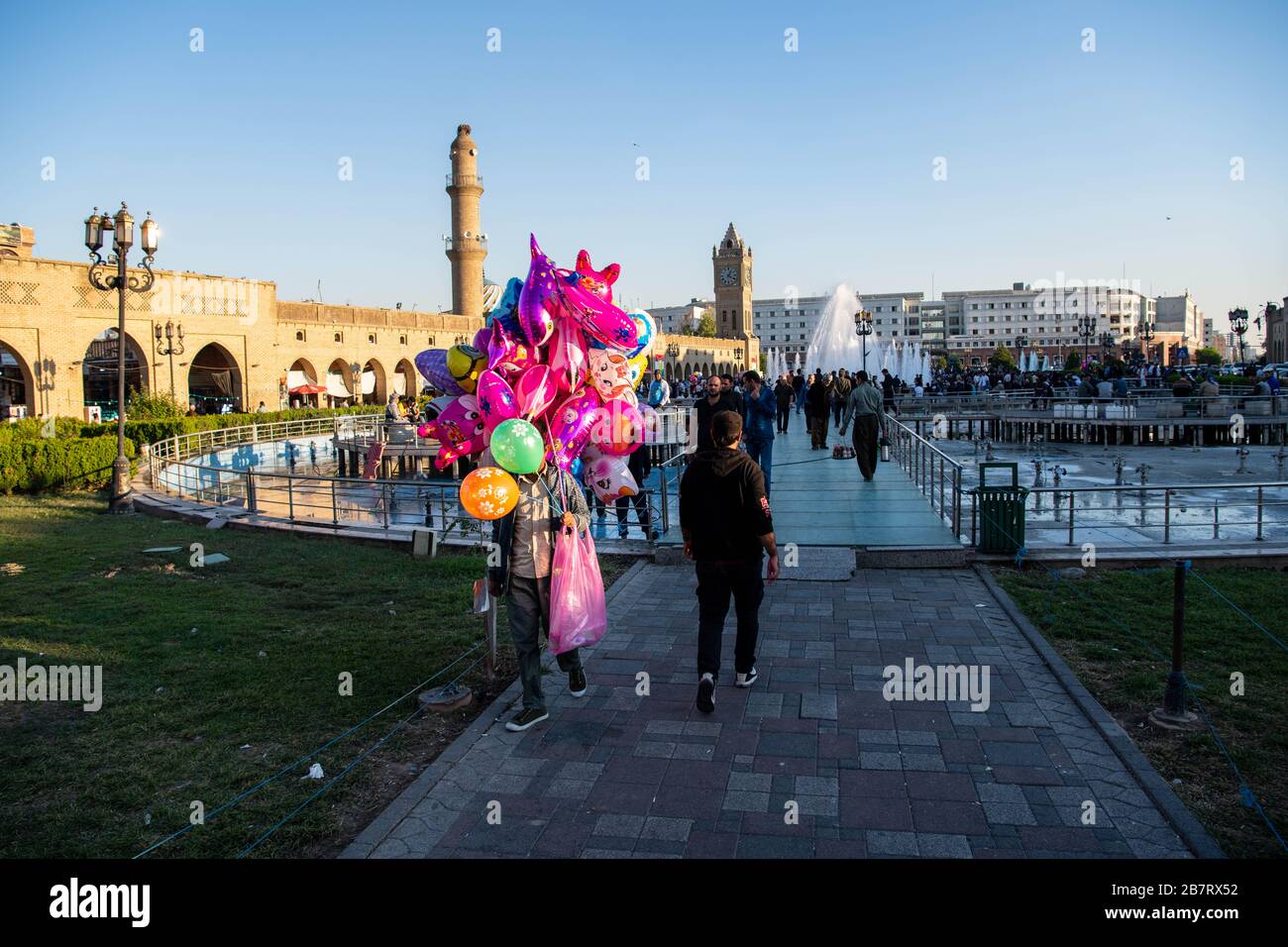Iraq, Iraqi Kurdistan, Arbil, Erbil. On the park Shar a man is walking ...